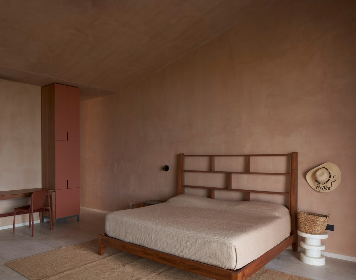 Una casa in stucco rosa con vista sul mare nello Yucatan (Messico ...